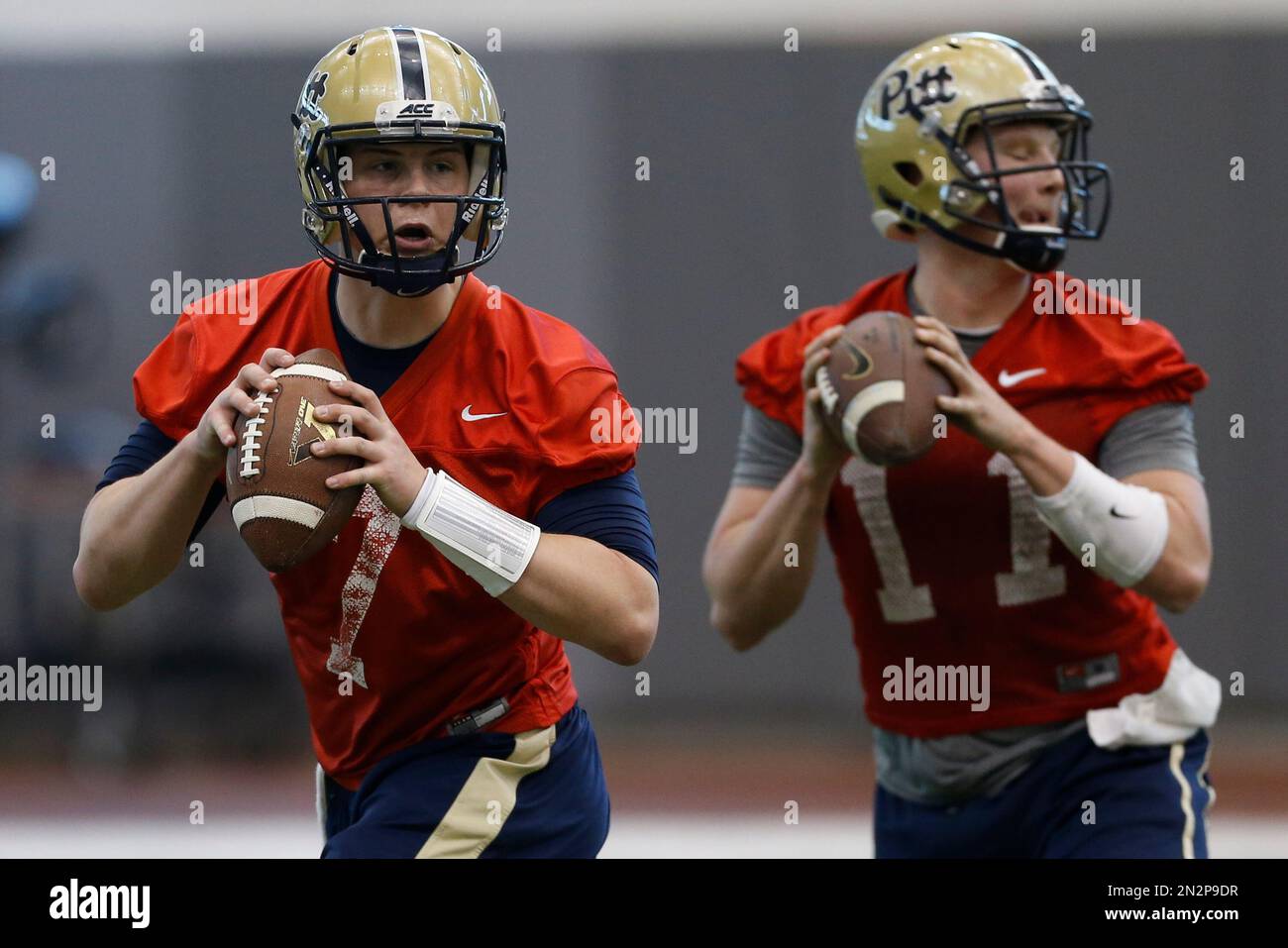 Pittsburgh quarterbacks Adam Bertke (7) and Trey Anderson (11) take ...