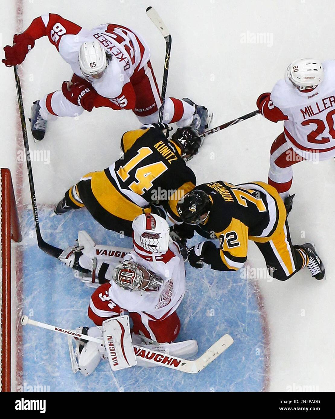 Detroit Red Wings goalie Petr Mrazek (34) reaches to make a glove save ...