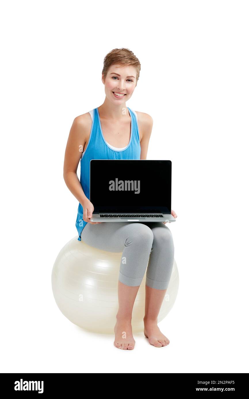 Laptop mockup, fitness and woman isolated on a white background sitting ...