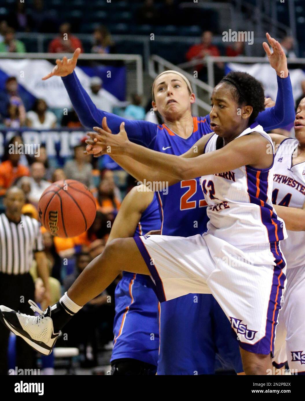 Northwestern State's Chelsea Rogers (12) and Houston Baptist's Anna ...