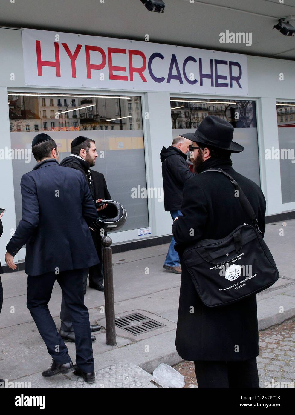 Customers shop at the Hyper Cacher during its reopening, in Paris ...
