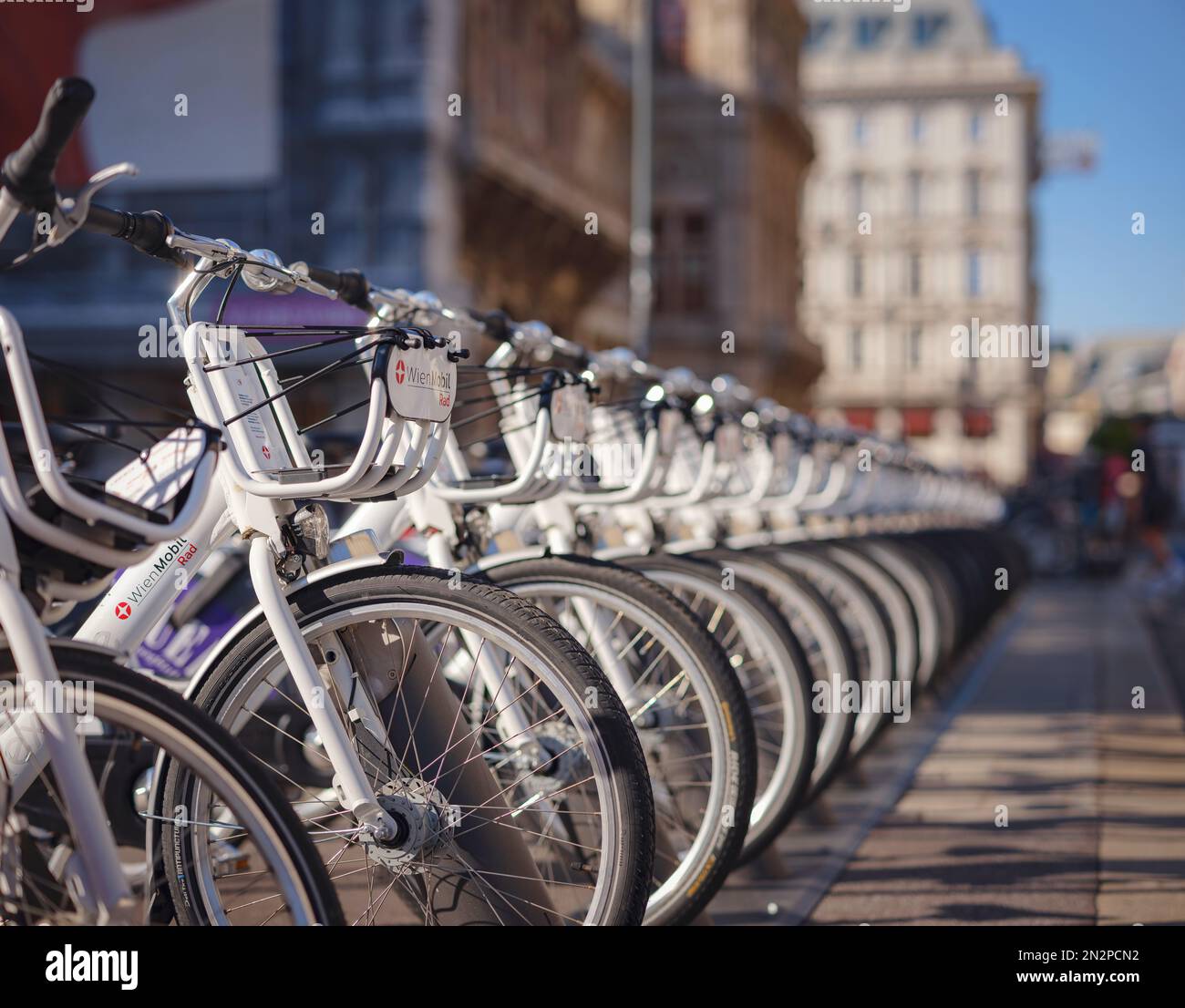Vienna, Austria - August 9, 2022 : Rental bikes on the parking. traffic ...