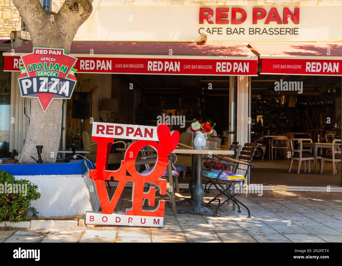 Love sign Red Pan cafe bar, Bodrum Turkey Stock Photo - Alamy