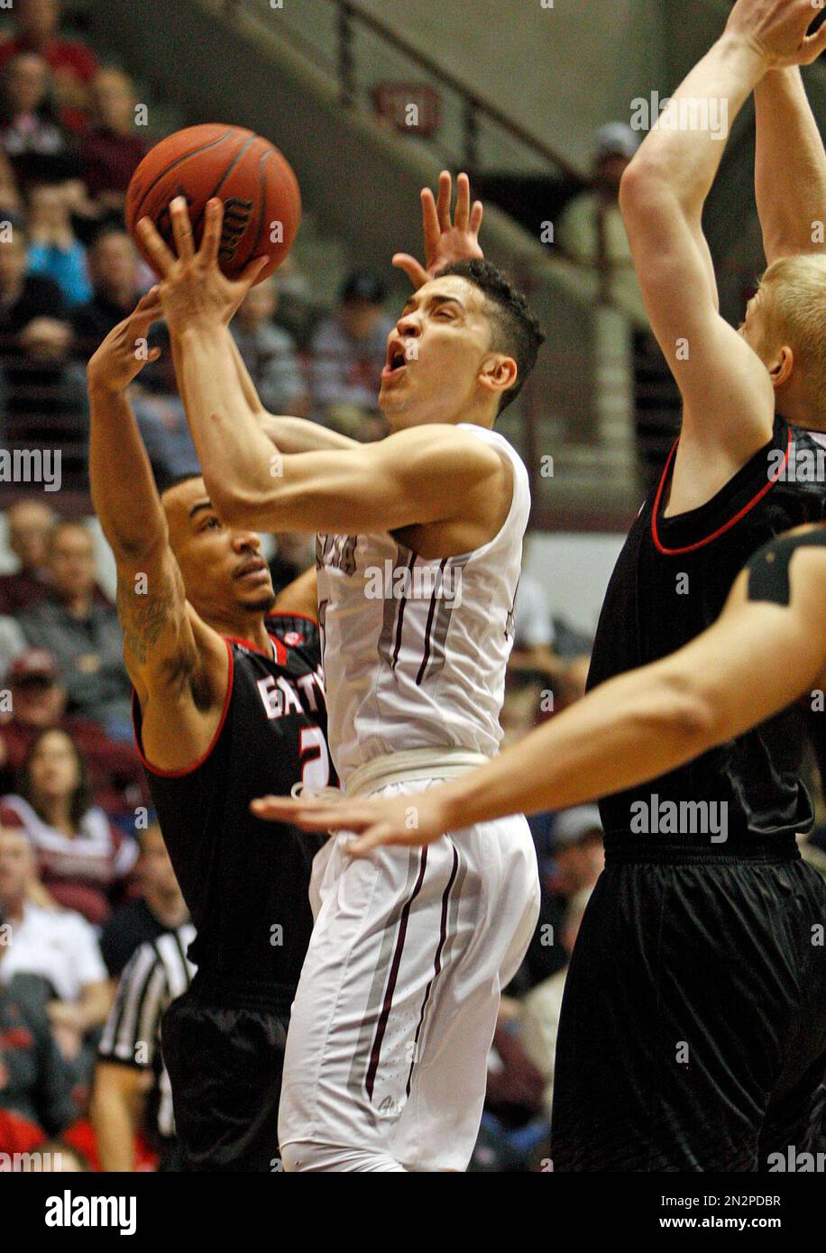 Montana guard Jordan Gregory(10) shoots in front of Eastern Washington ...