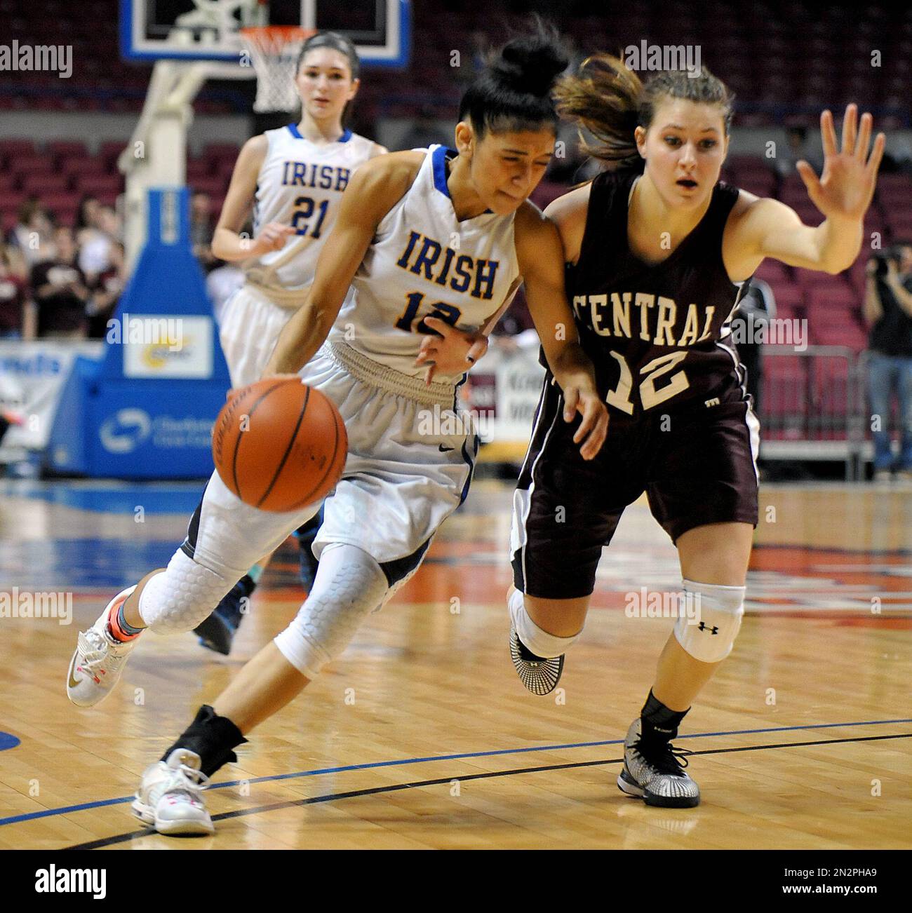 St. Joseph Central's Mychelle Johnson (12) drives the lane against ...
