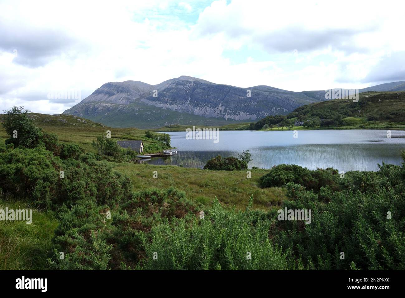 The Scottish Mountain Corbett 'Arkle' and a Boat House on Loch Stack ...