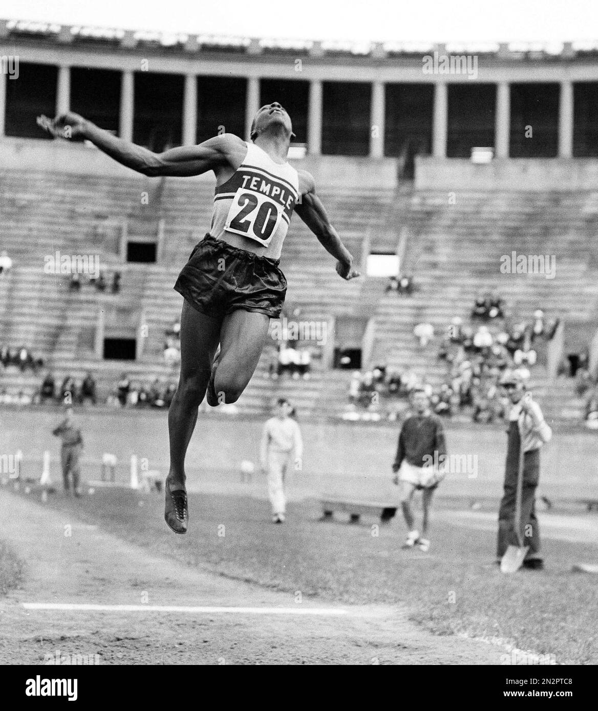 Temple University track star Eulace Peacock is shown in the broad ...