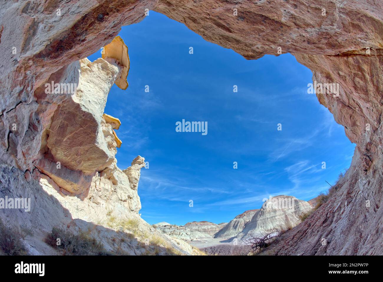 View from a dry waterfall cave on the west side of Red Basin, Petrified ...