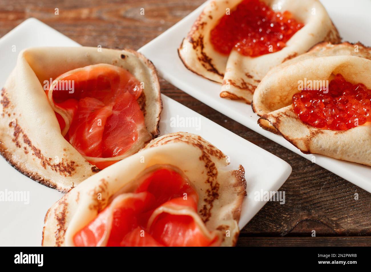 Set of dessert crepes with seafood Stock Photo - Alamy