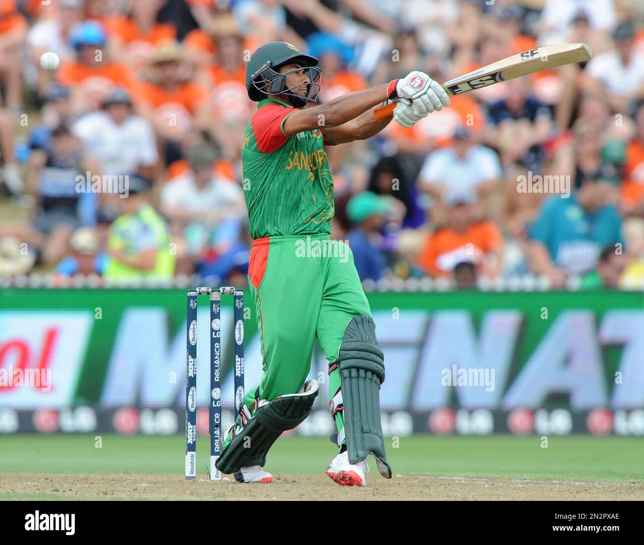 Bangladesh’s Mahmudullah swings at the ball while batting against New ...
