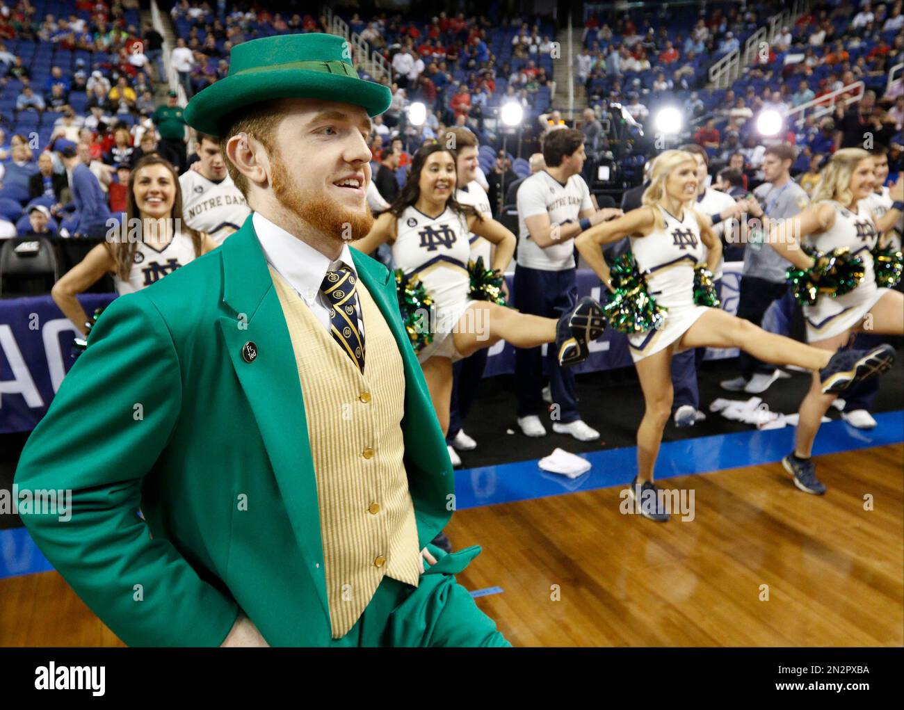 The Notre Dame mascot performs during the first half of an NCAA college ...