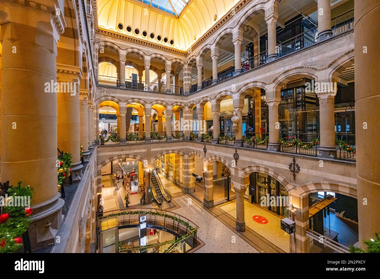The interior of Magna Plaza shopping arcade in Amsterdam Netherlands ...