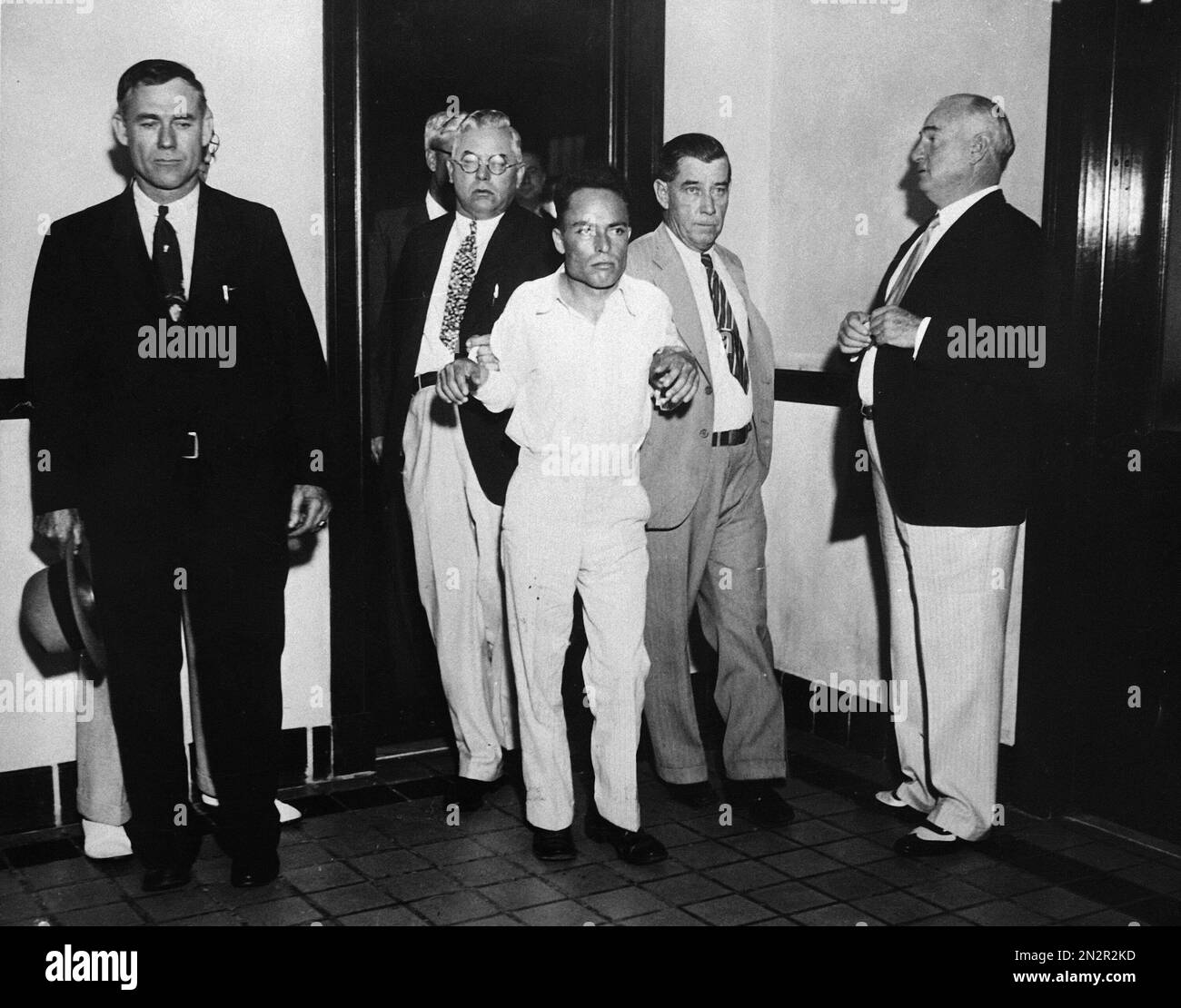Giuseppe Zangara, center, in white, the man who fired gun at President ...