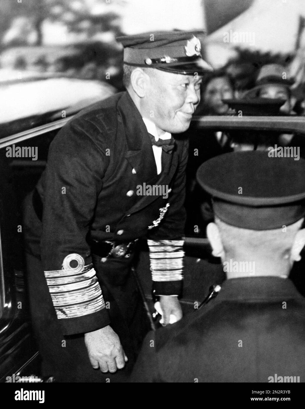 Admiral Osami Nagano arriving at the residence of Premier Koki Hirota in Tokyo, Japan, on March ...