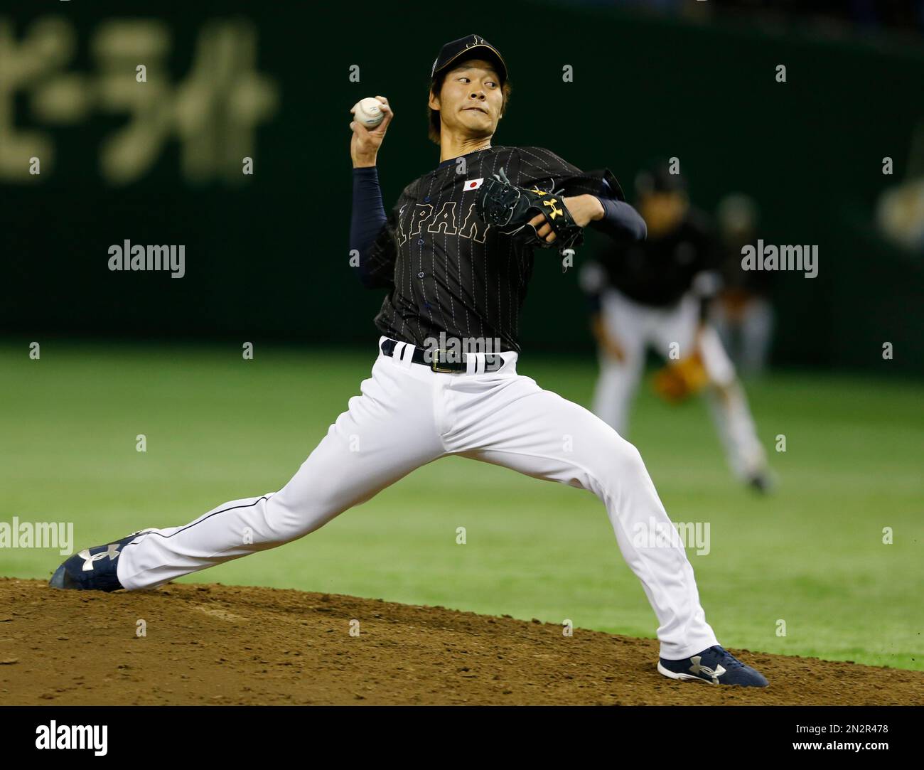 Team Japan's Shota Takeda pitches against Team Europe in the sixth ...