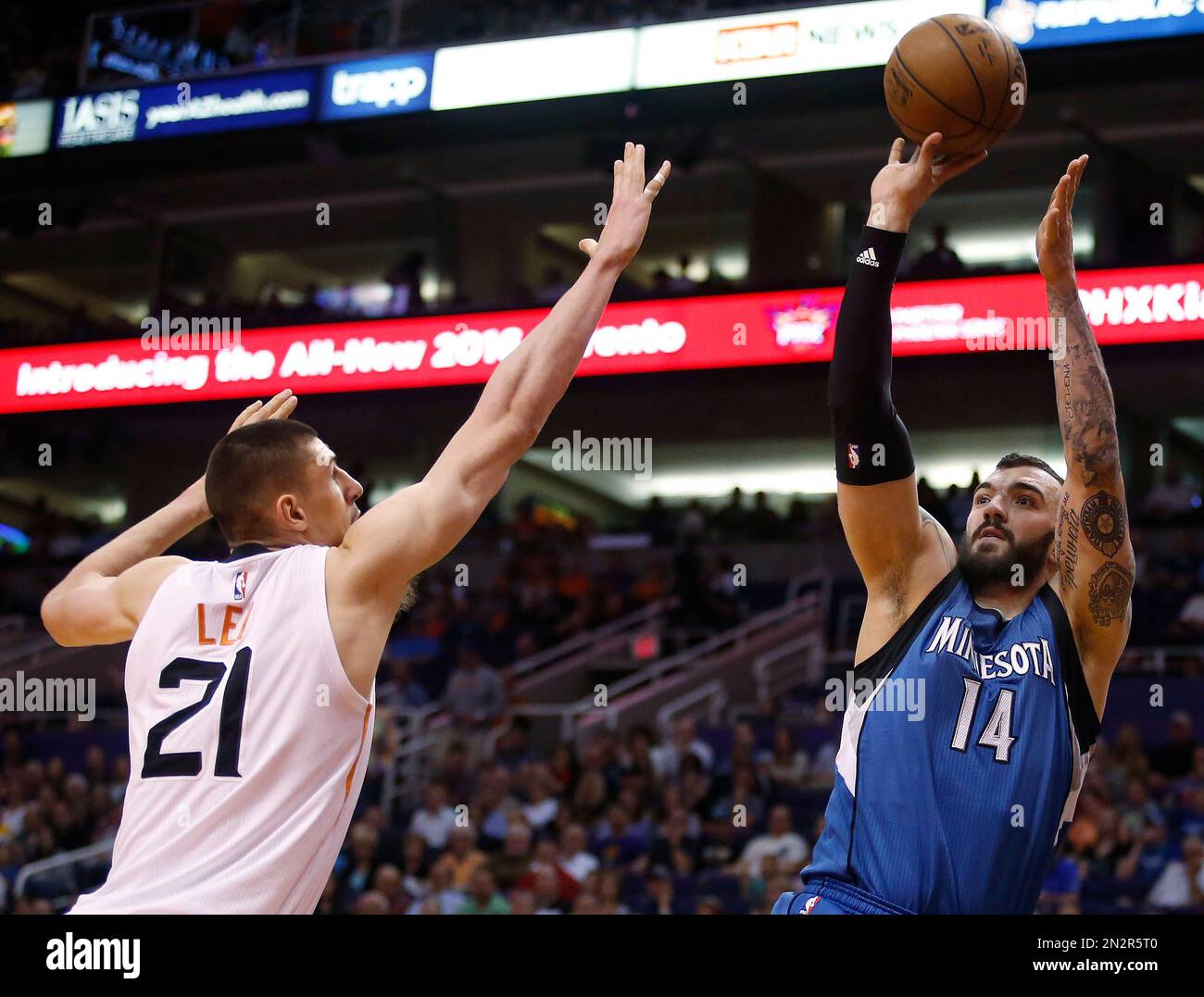 Minnesota Timberwolves center Nikola Pekovic (14) shoots over Phoenix ...