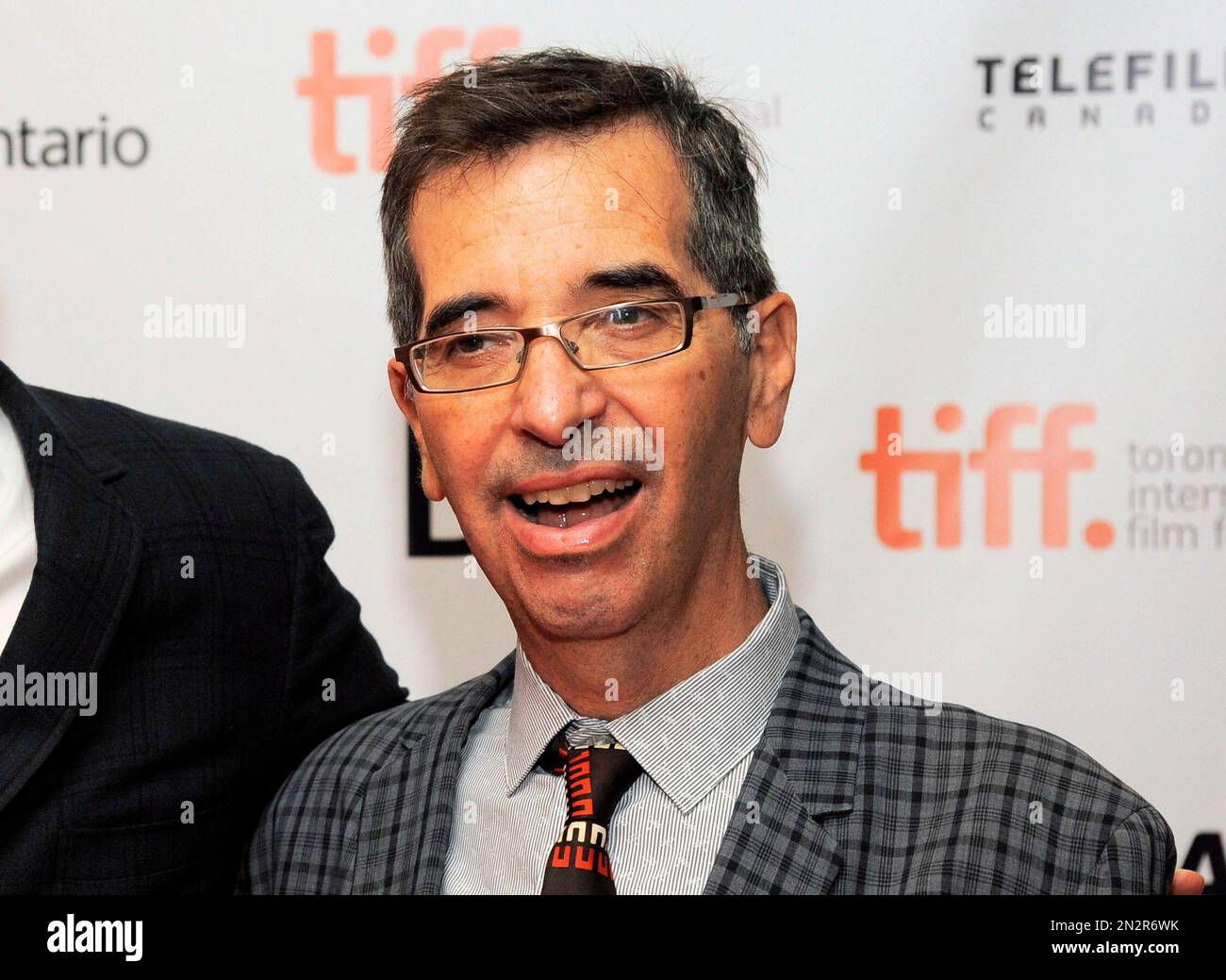 FILE - In this Sept. 6, 2013 file photo, director Richard Glatzer poses ...