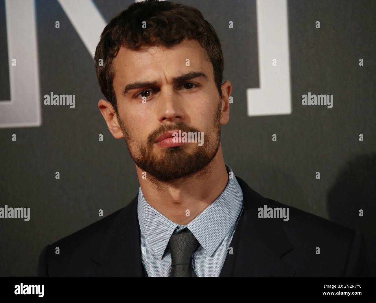 Actor Theo James poses for photographers upon arrival at a central ...