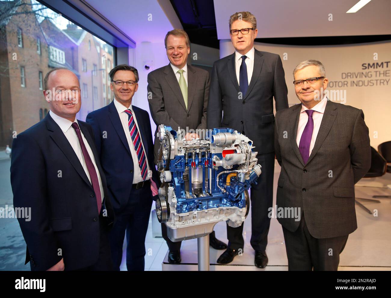 Car industry executives, from left, Jaguar Land Rover Managing Director ...