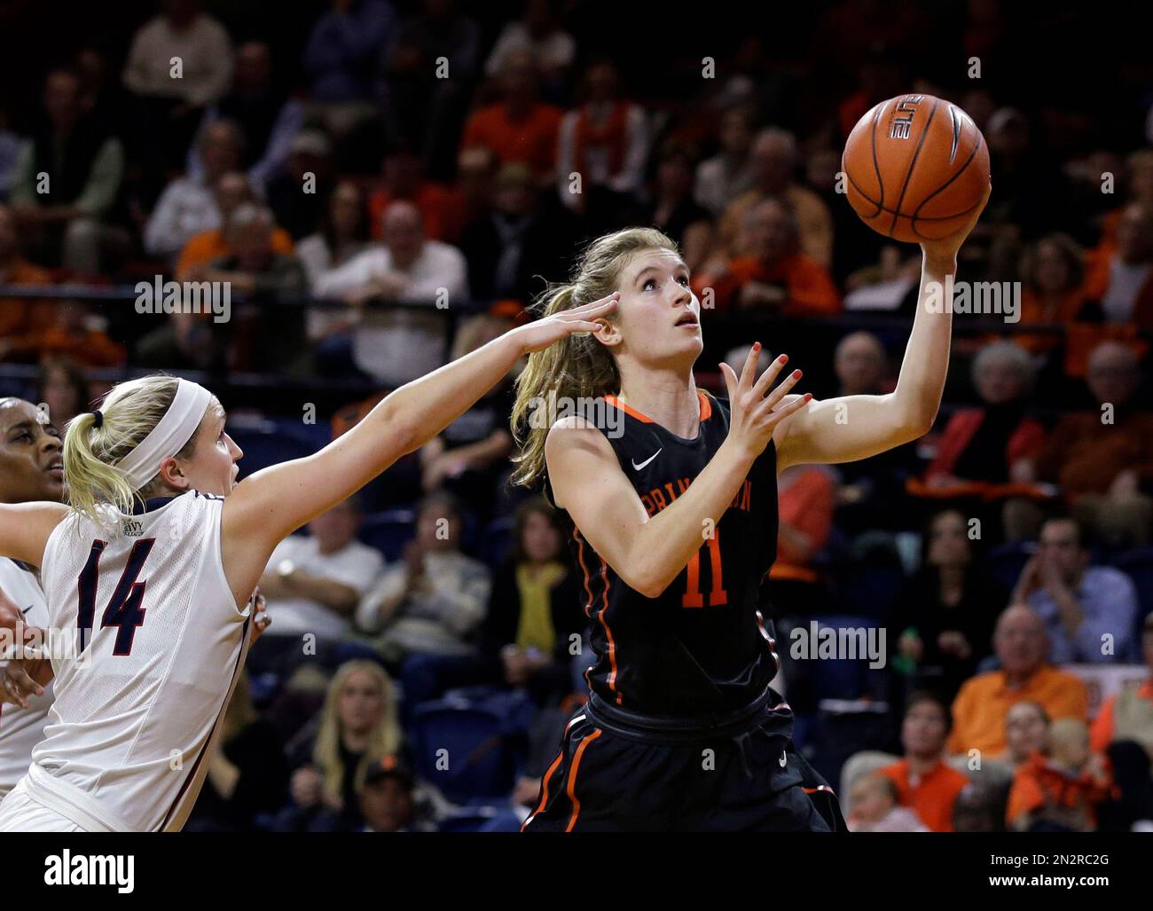 Princeton guard Blake Dietrick (11) takes a shot past Pennsylvania ...