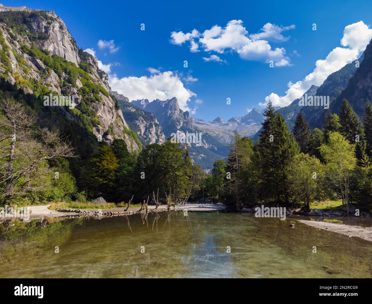 Alpine lake in mountain valley, Lombardy, Italy Stock Photo - Alamy