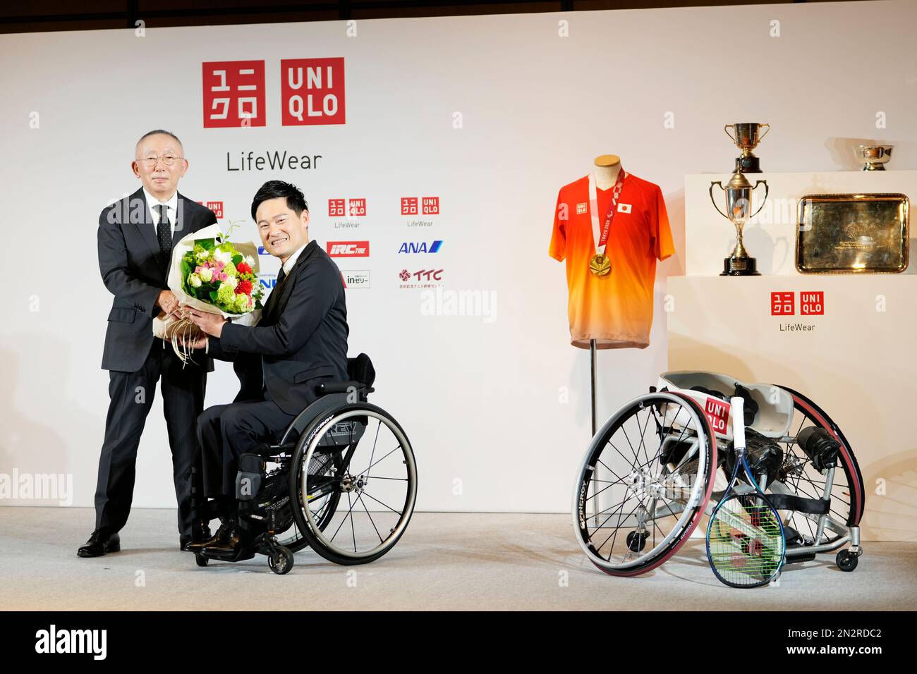 President and chief executive of Uniqlo Co. Ltd. Tadashi Yanai, left ...