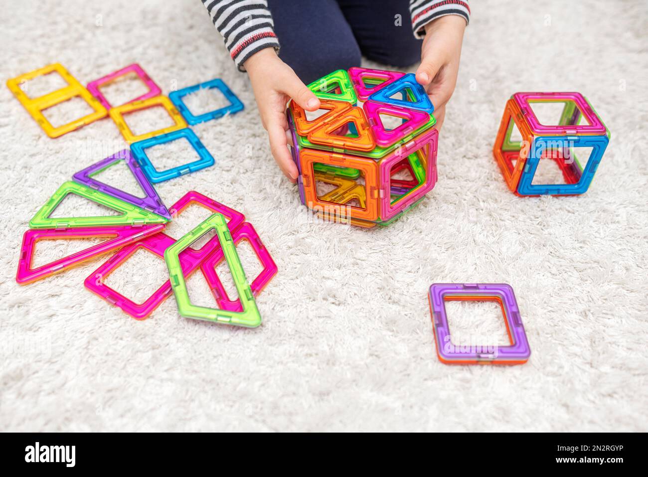 Figures from the magnetic designer Stock Photo - Alamy