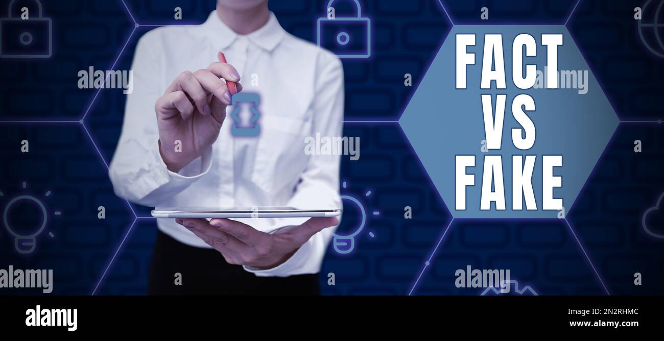 Hand writing sign Fact Vs Fake, Business concept Is it true or is false ...