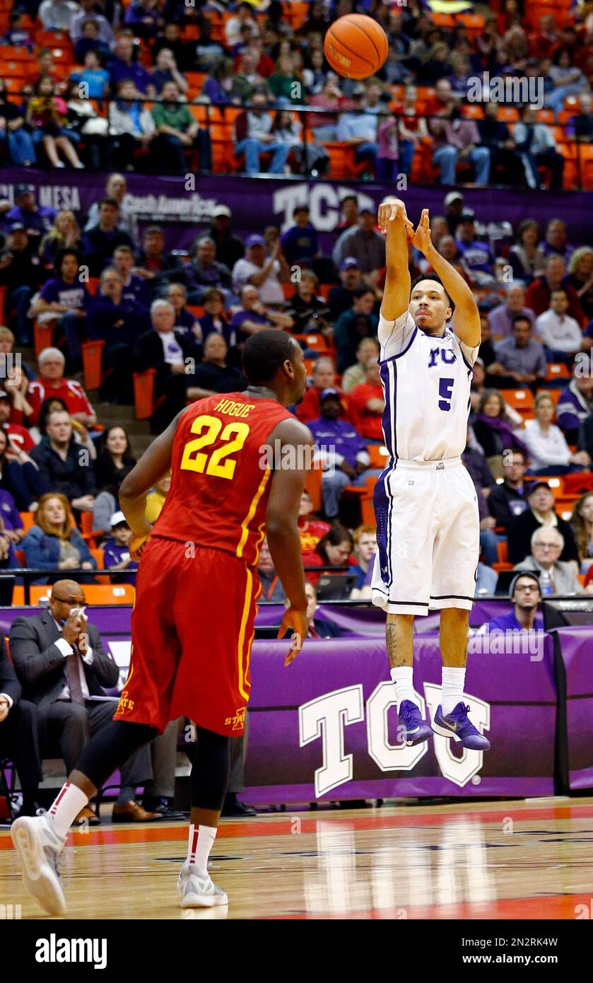 TCU guard Kyan Anderson (5) shoots as Iowa State forward Dustin Hogue ...