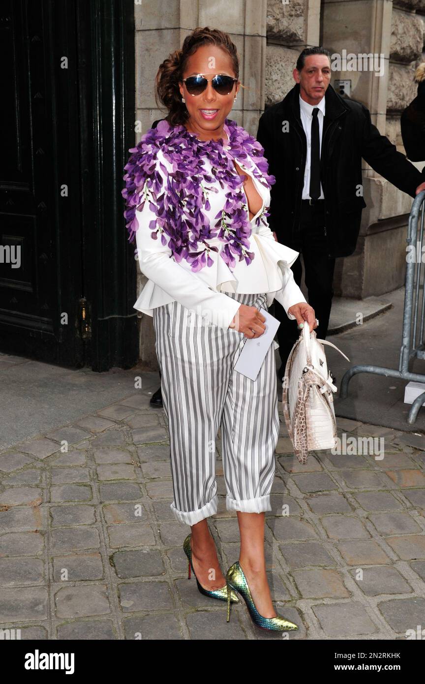 Marjorie Harvey, wife of actor Steve Harvey, poses for photographers as ...