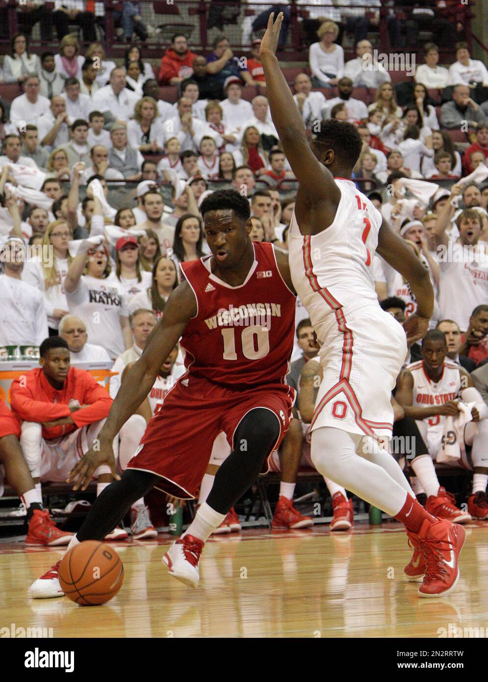 Wisconsin's Nigel Hayes, left, drives the baseline against Ohio State's ...