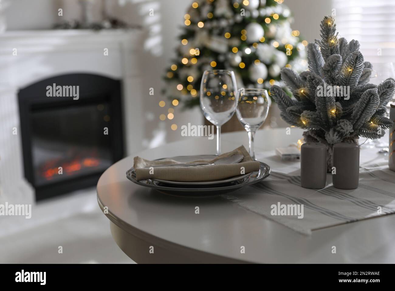 Festive table setting and beautiful Christmas decor indoors. Interior ...