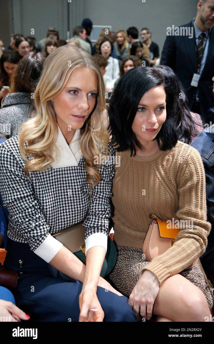 Model Poppy Delevingne, left, and DJ Leigh Lezark pose for ...
