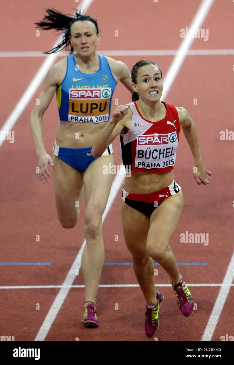 Switzerland's gold medal winner Selina Buechel, right, races in front ...