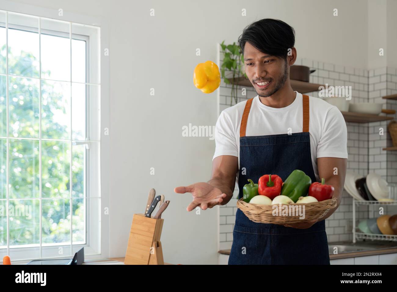 Men in the kitchen preparing materials ready to cook Stock Photo - Alamy