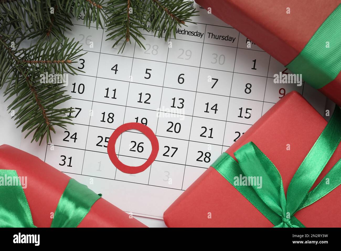 Gifts on calendar with marked Boxing Day date, flat lay Stock Photo - Alamy