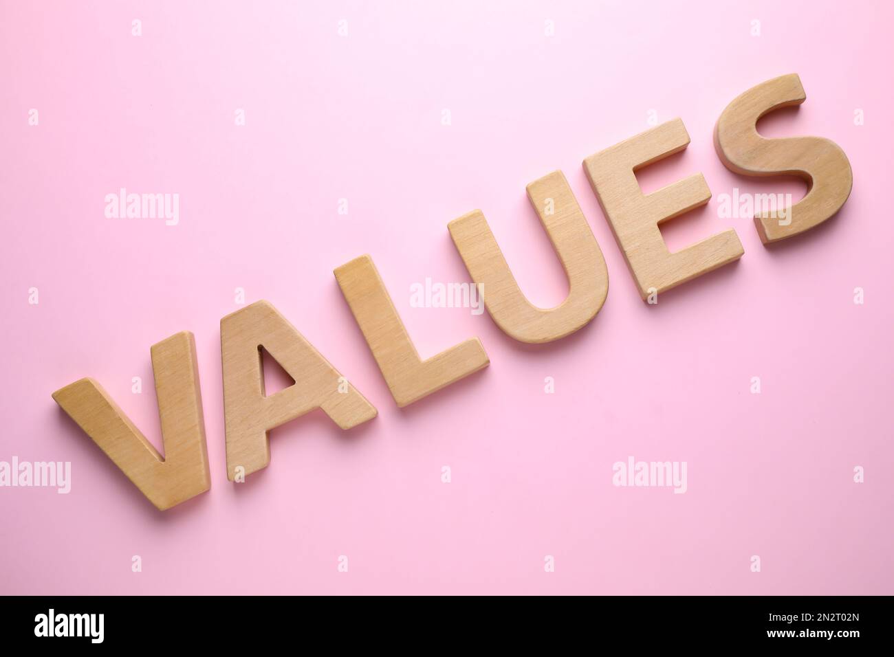 Word VALUES made of wooden letters on pink background, flat lay Stock ...