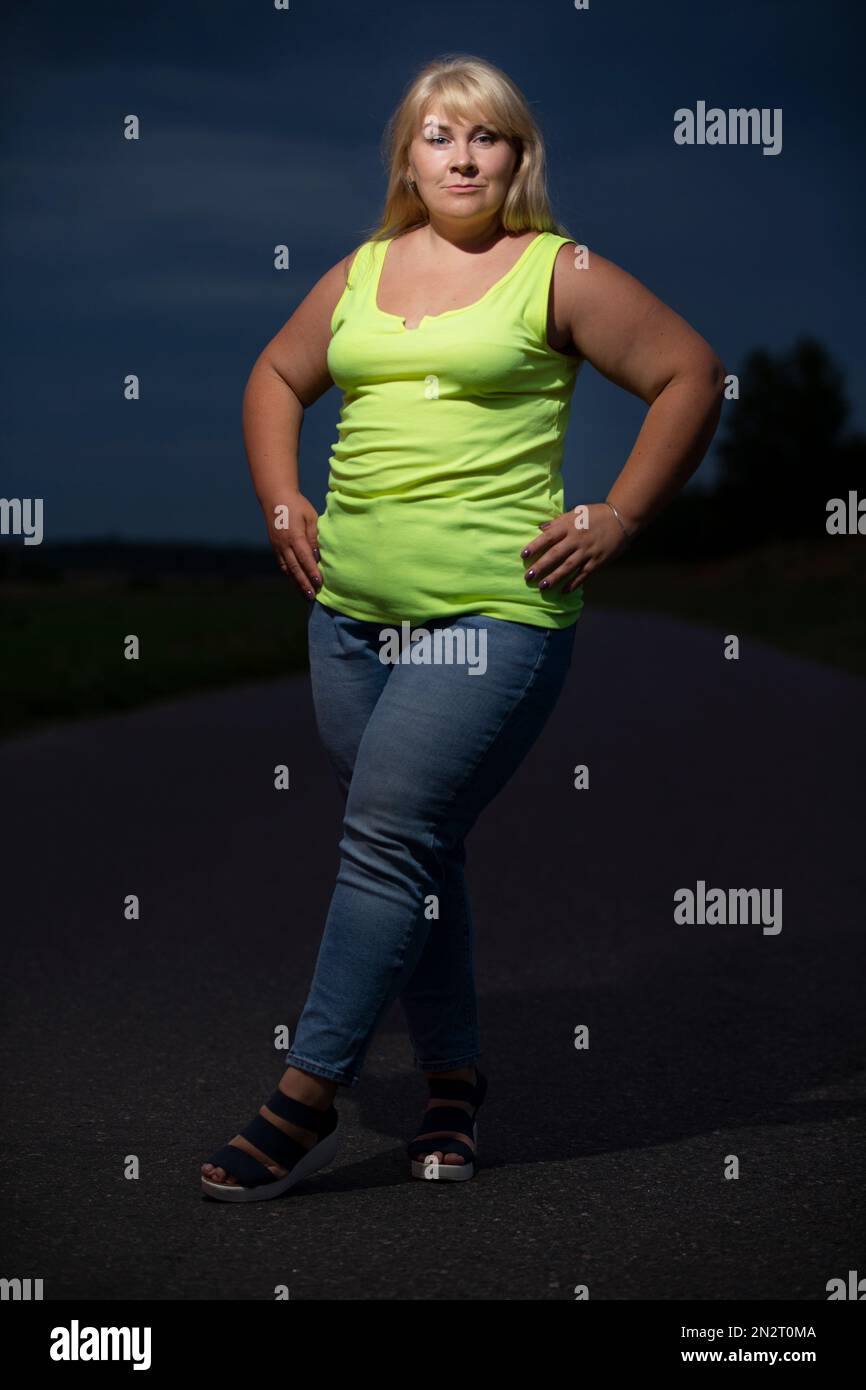 Obese woman in jeans hi-res stock photography and images - Alamy