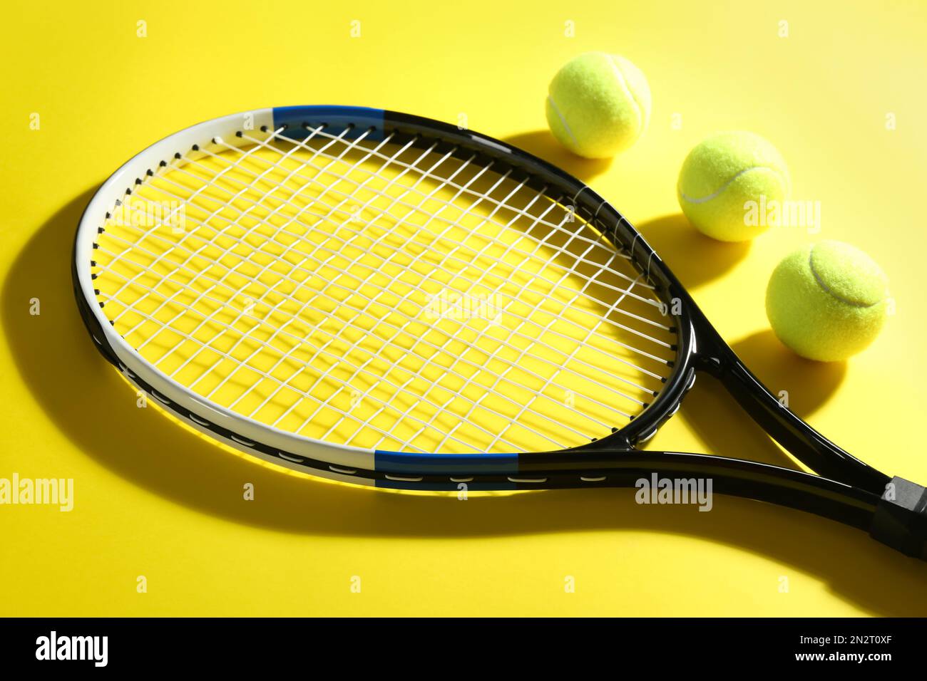 Yellow tennis racket strings hi-res stock photography and images - Alamy