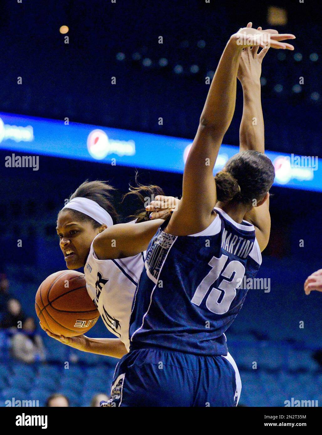 Xavier forward Briana Glover (14) works the ball inside against ...