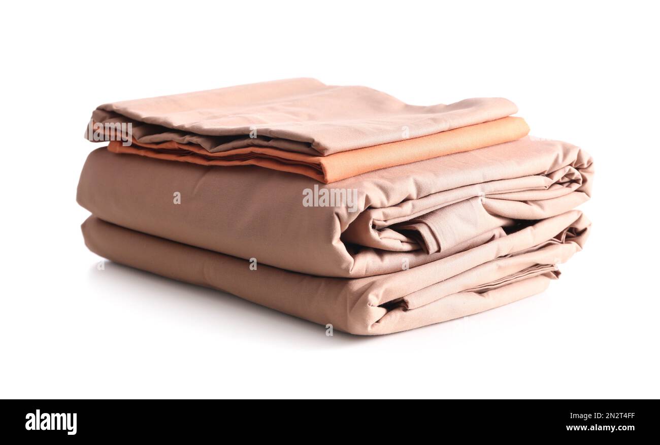 Stack of clean bed sheets isolated on white Stock Photo - Alamy