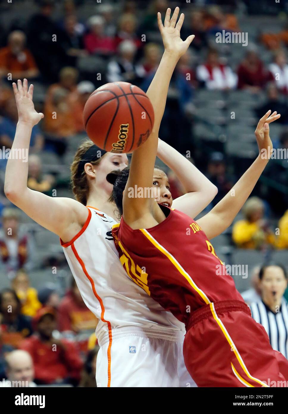 Iowa State guard Brynn Williamson, right, loses control of the ball as ...