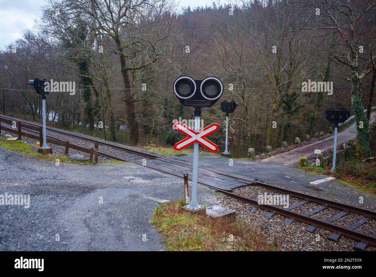 railway level crossing marked with traffic lights and signs Stock Photo ...
