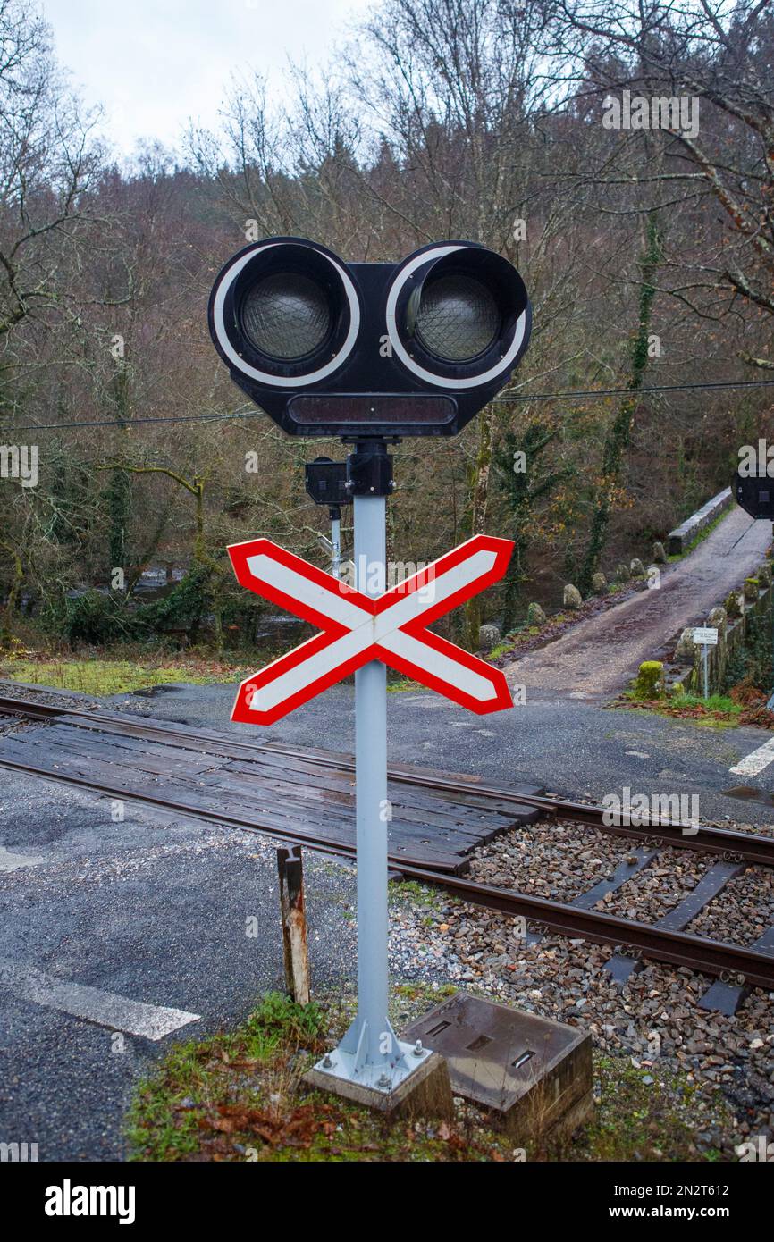 railway level crossing marked with traffic lights and signs Stock Photo ...