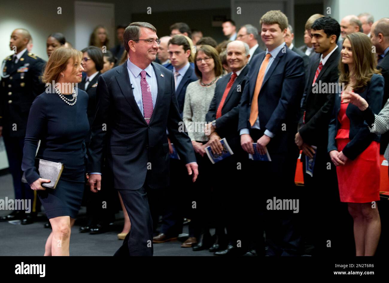 Defense Secretary Ash Carter, front second from right to left, walks ...
