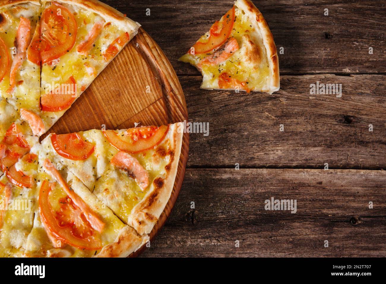 Pizza cut in slices. Junk food, unhealthy eating Stock Photo - Alamy