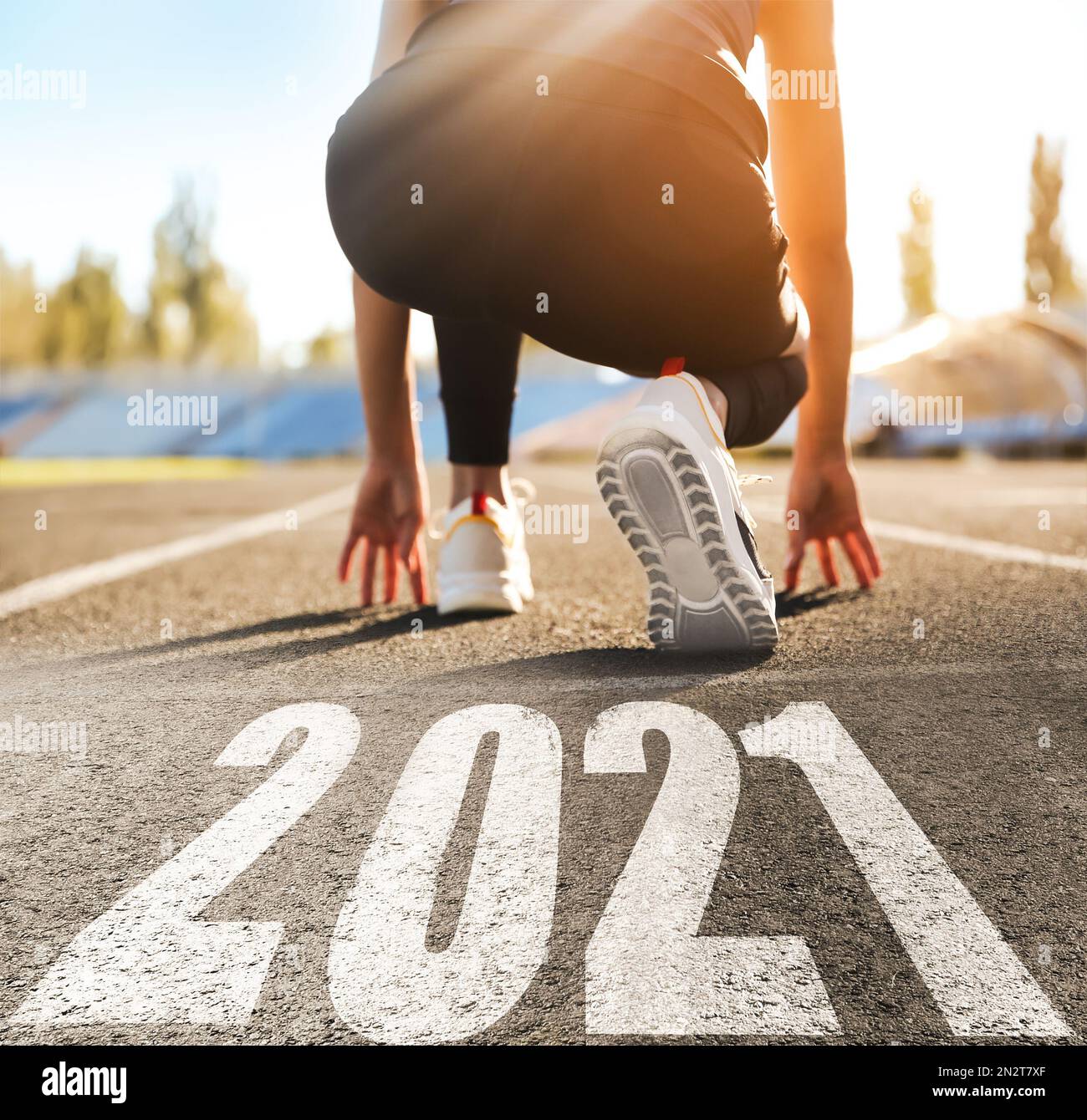 Start new year with fresh vision and ideas. Sporty woman ready for ...