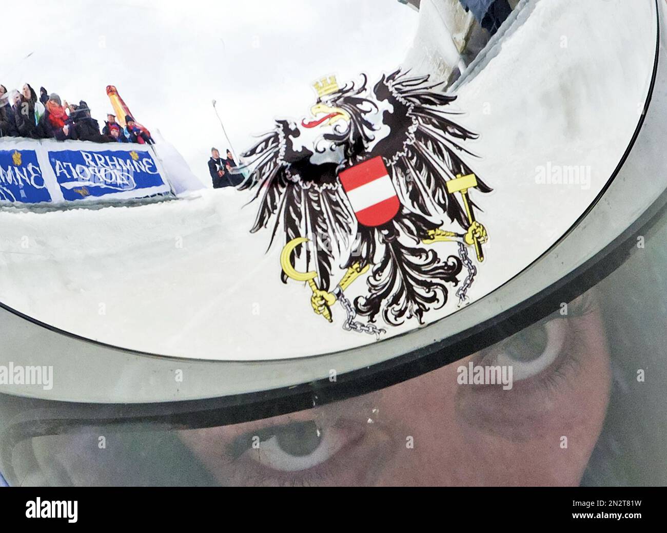 The track reflects in the helmet of Janine Flock of Austria during her ...