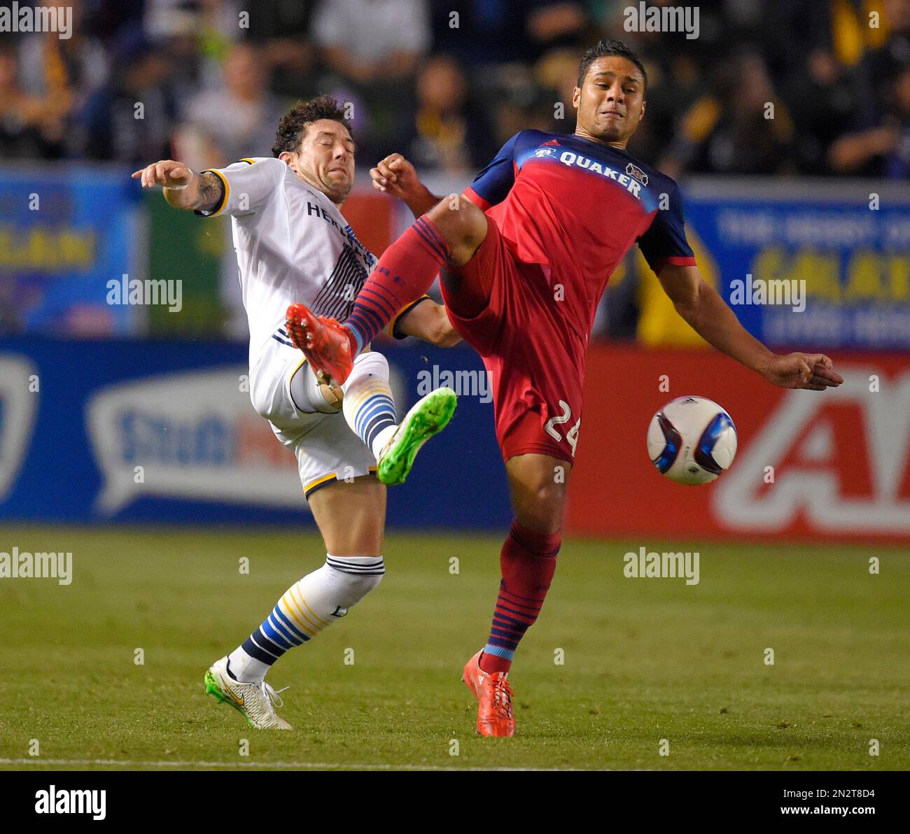 Los Angeles Galaxy defender Dan Gargan, left, and Chicago Fire forward ...