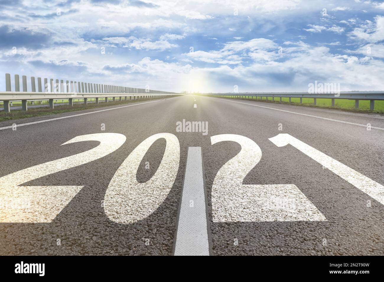 Start new year with fresh vision and ideas. 2021 numbers on asphalt ...